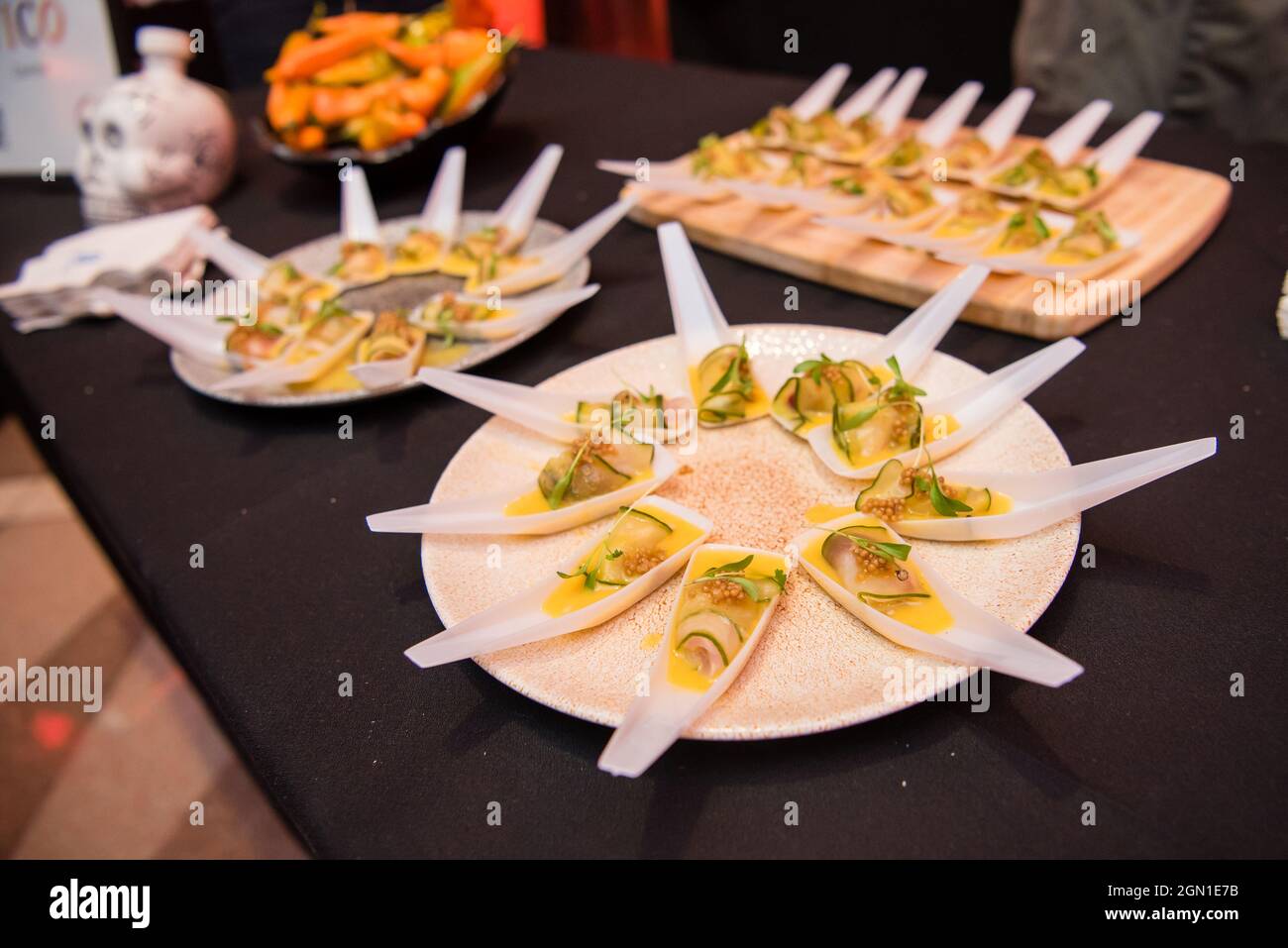 Japanese spoon appetizers with cucumber and garnish Stock Photo - Alamy