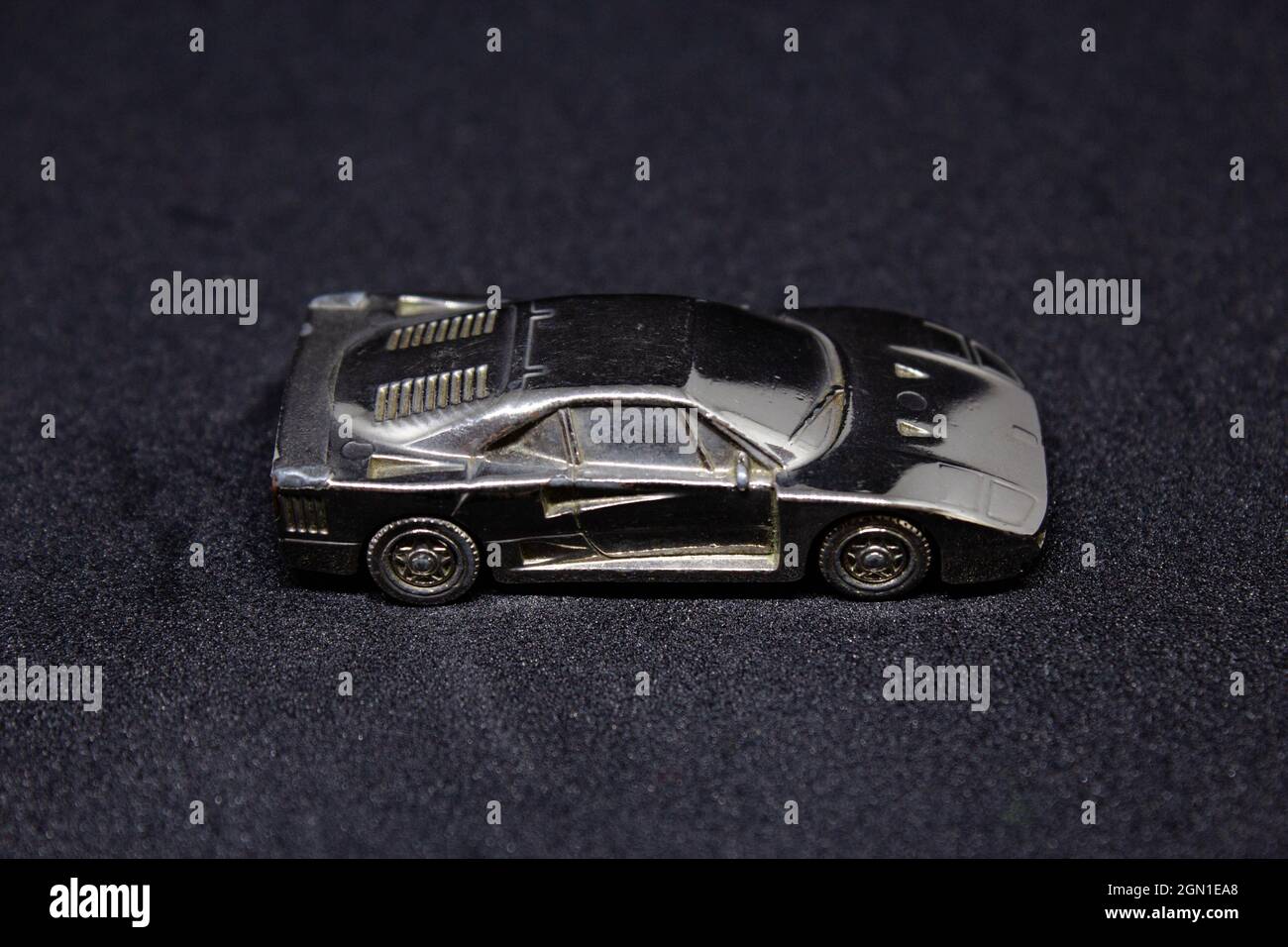 Silver toy car facing different sides. Interesting silver car ...