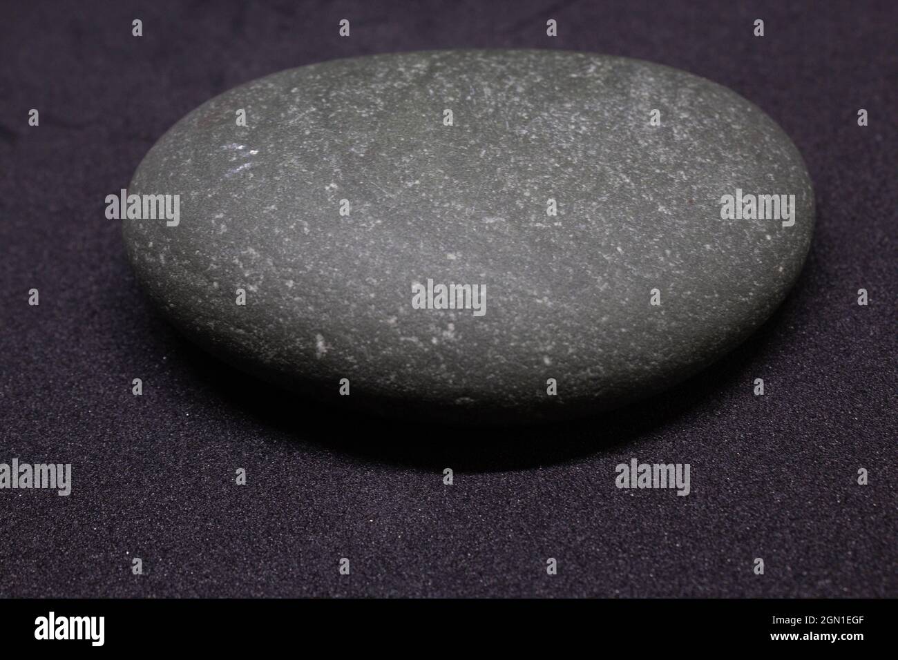 an oval-shaped pebble. pebble is called river rock in Turkish Stock ...