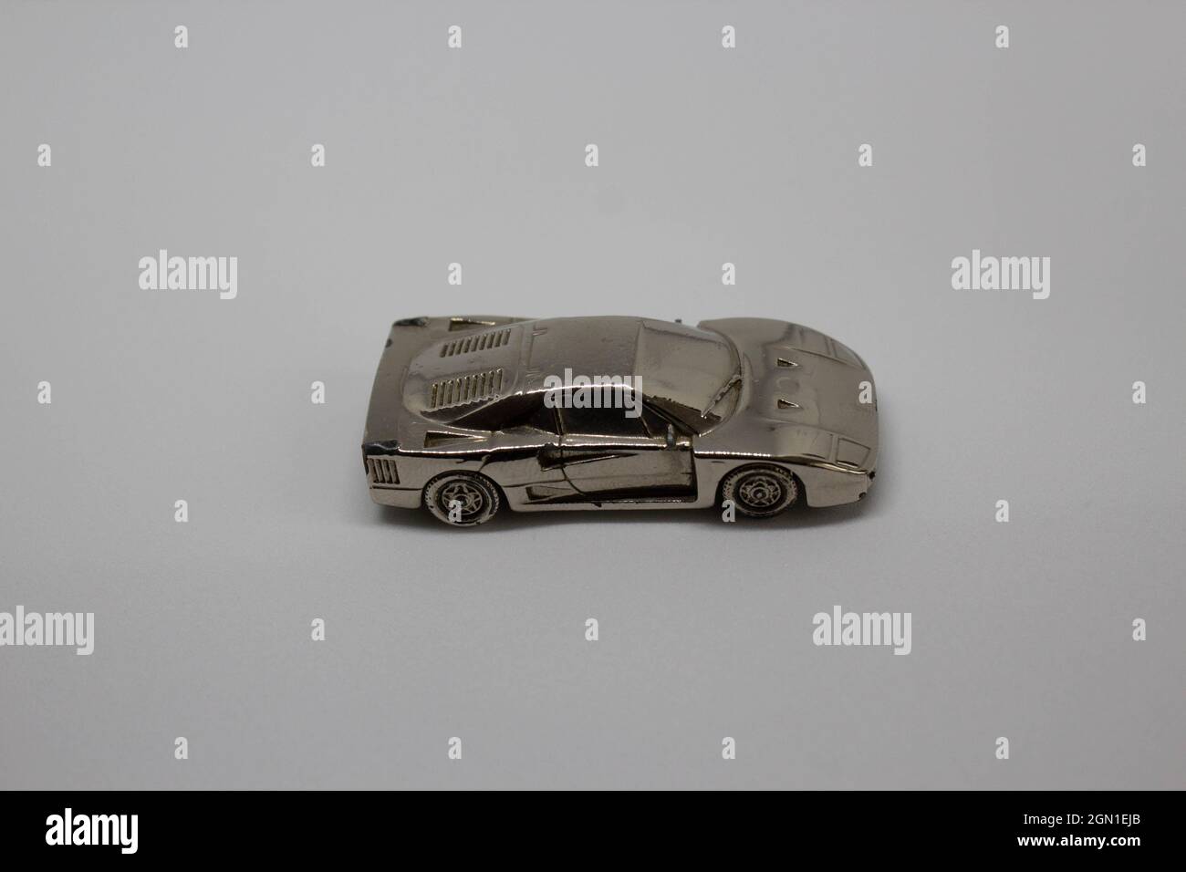 Silver toy car facing different sides. Interesting silver car ...