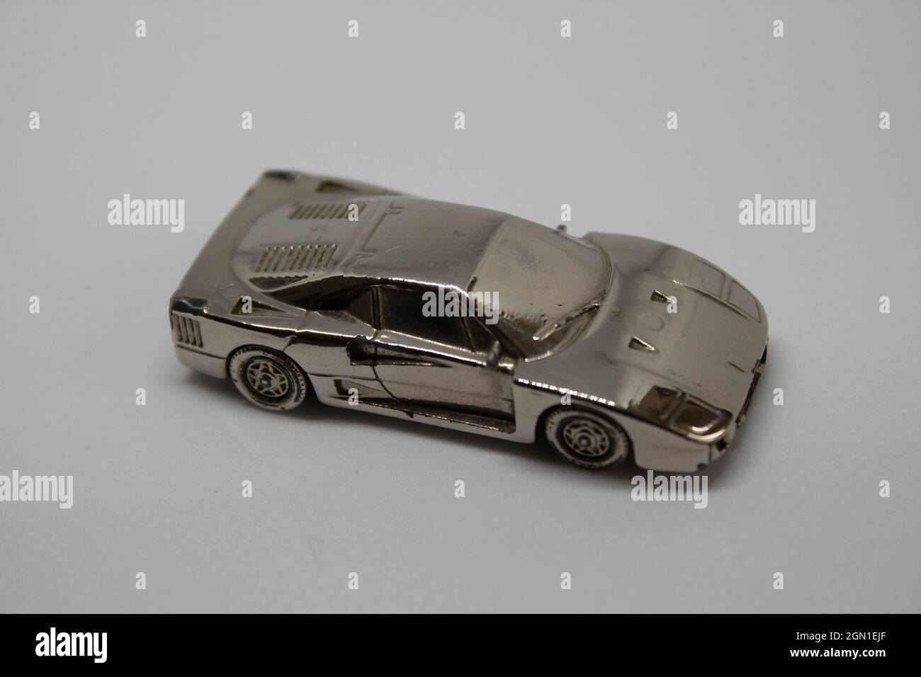 Silver toy car facing different sides. Interesting silver car ...