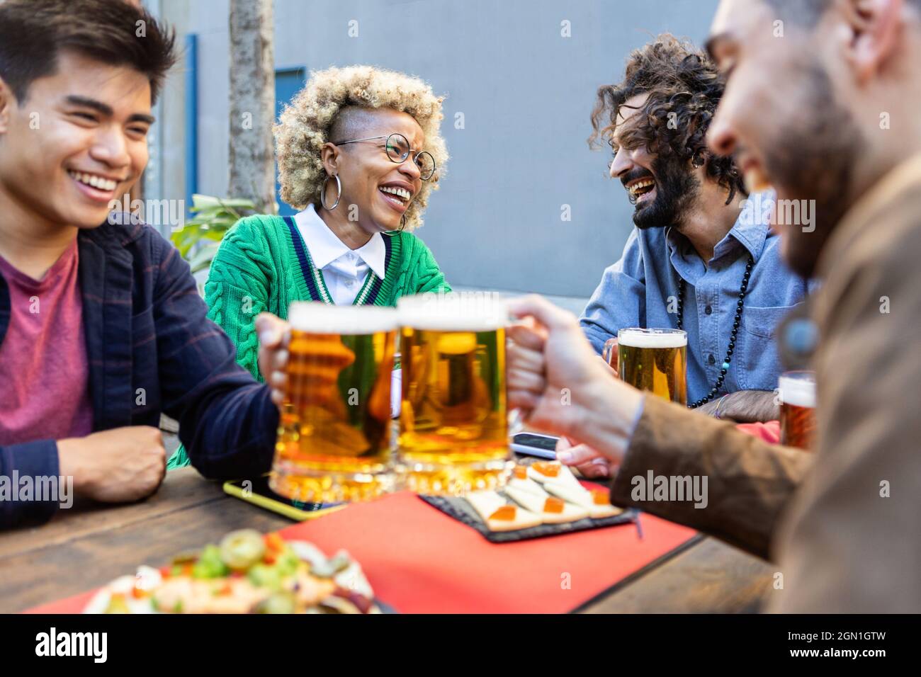 Mixed group happy outside uk hi-res stock photography and images - Alamy