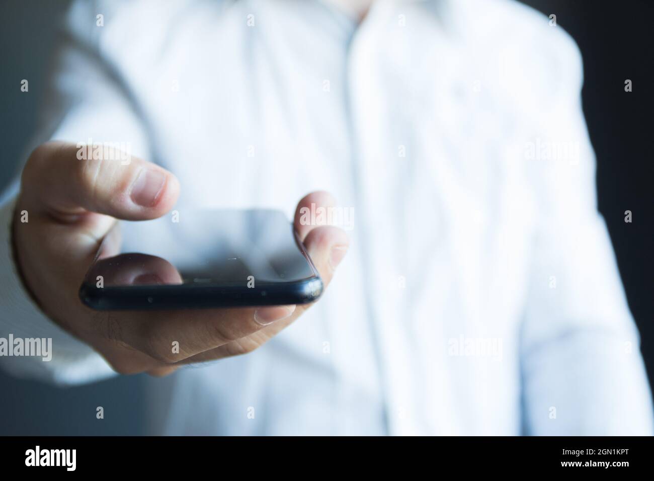 Handing a camera to a person hi-res stock photography and images - Alamy