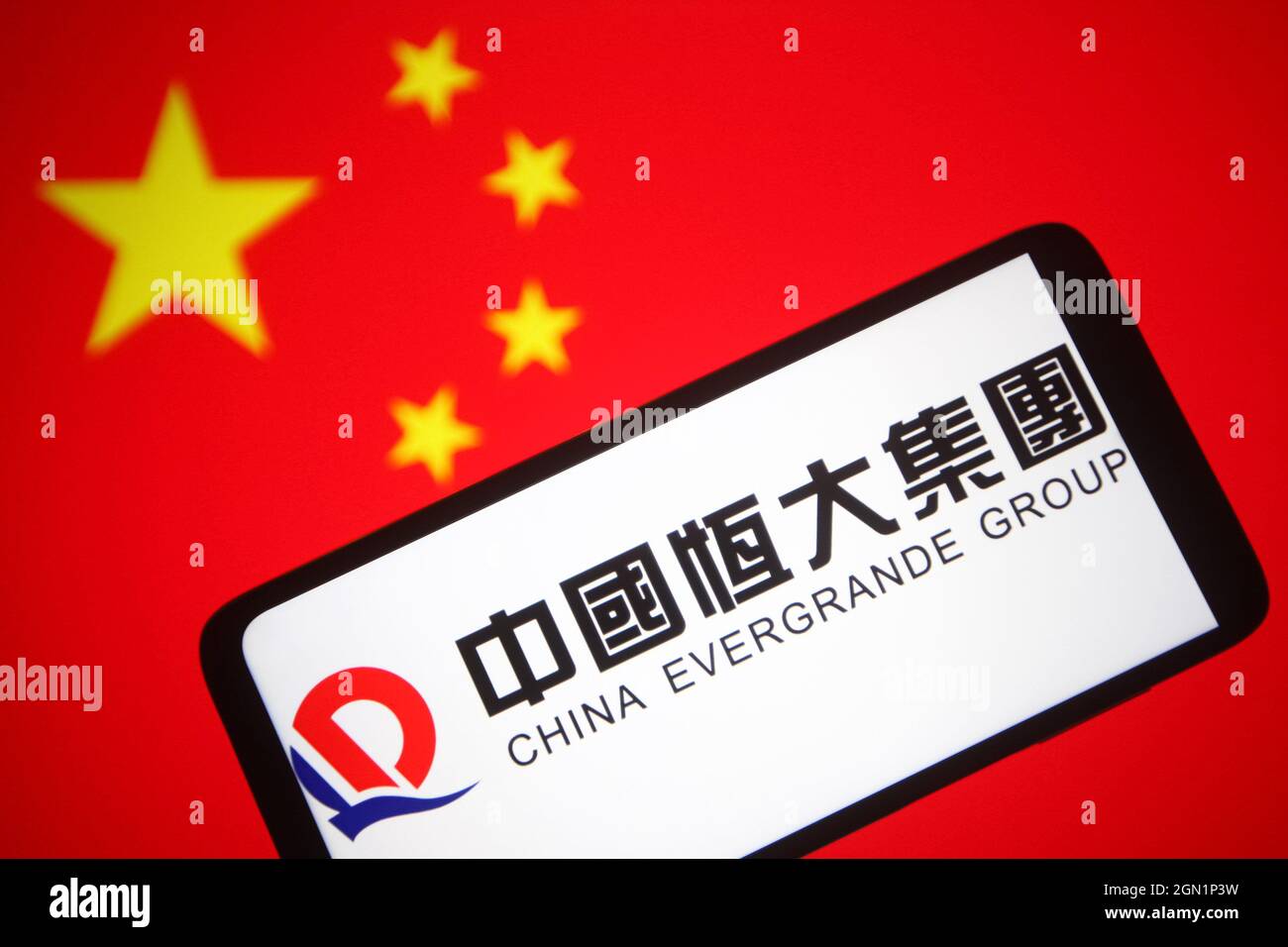 In this photo illustration a China Evergrande Group logo is seen on a ...