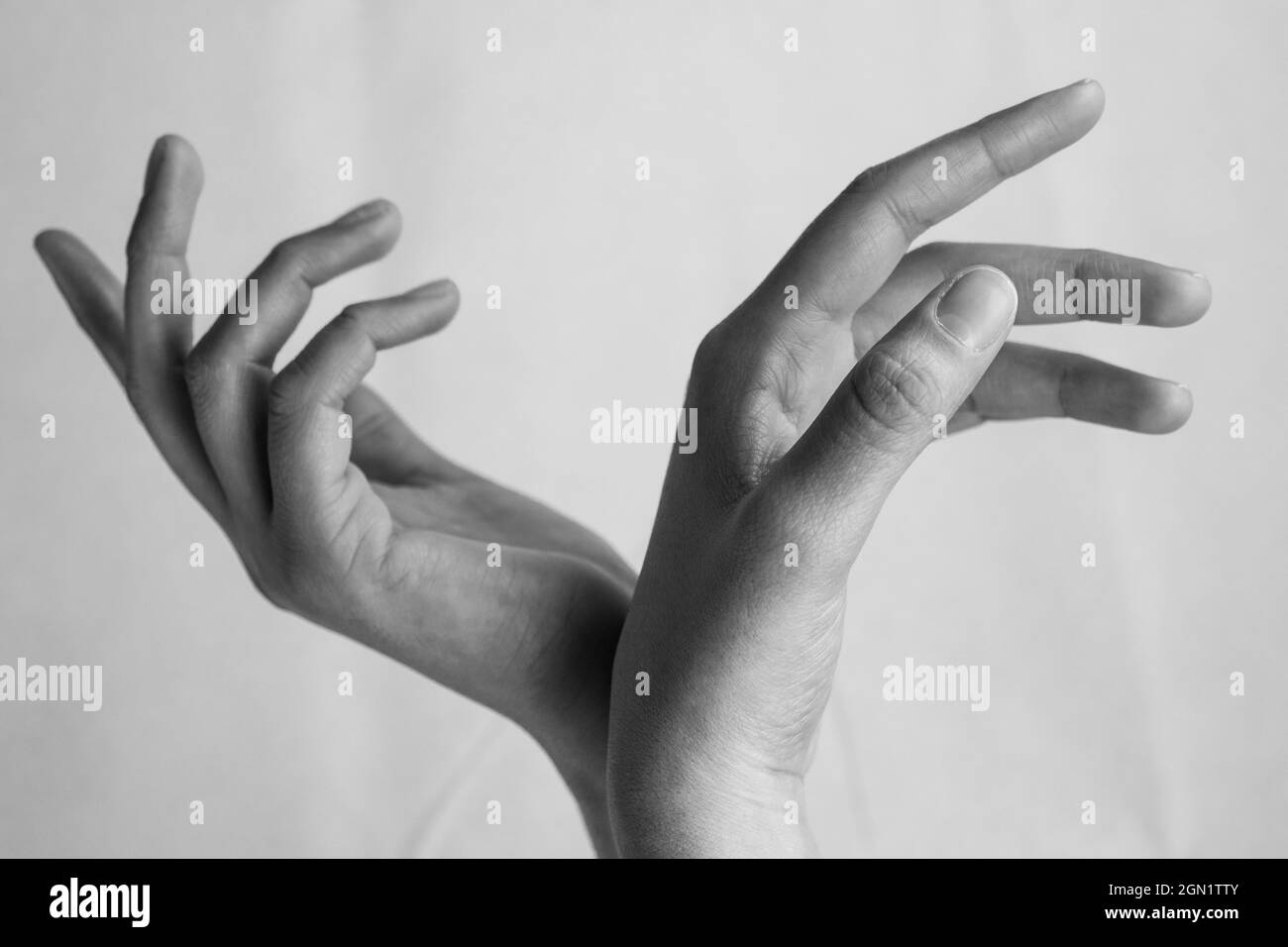 Grayscale shot of posing hands Stock Photo - Alamy