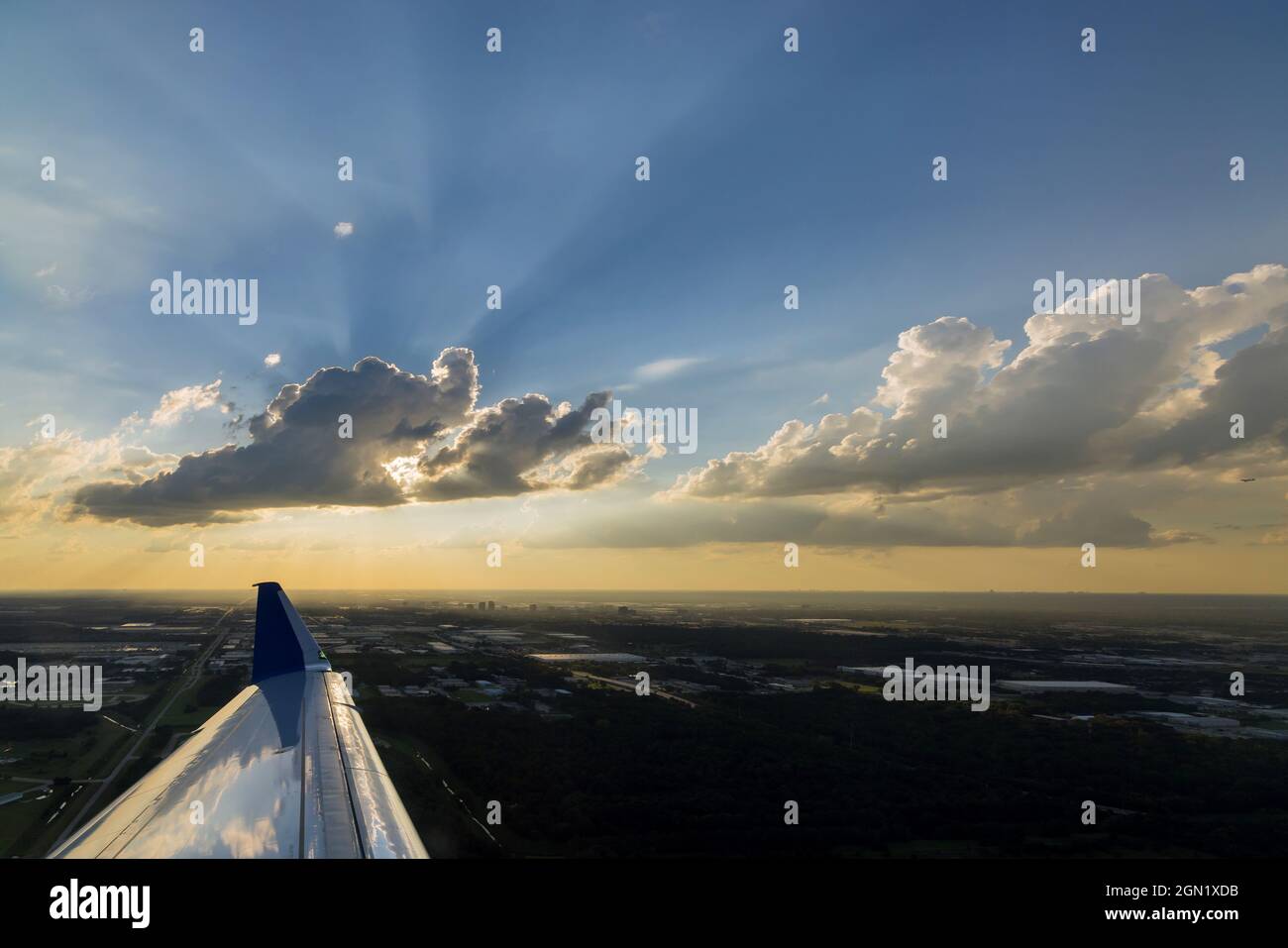 Airplane wing during flight at a wonderful sunset Stock Photo - Alamy