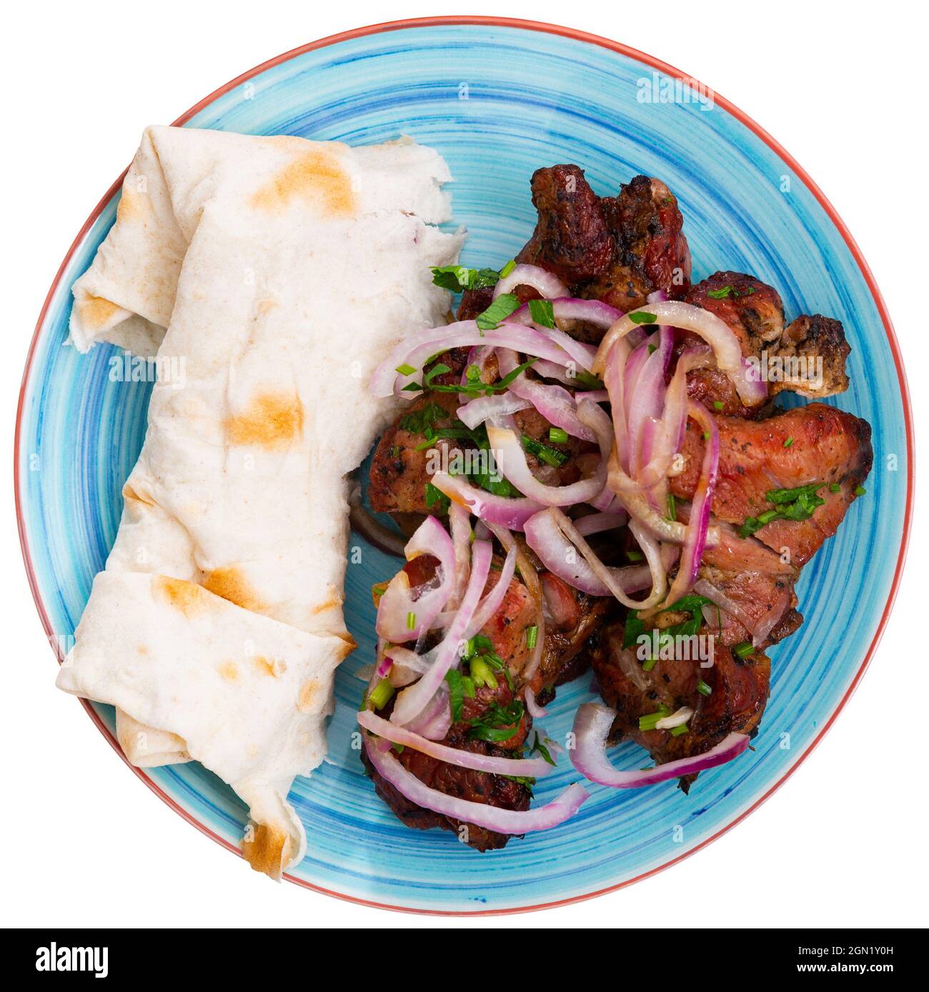 Grilled pork meat shashlik with sliced onion Stock Photo - Alamy