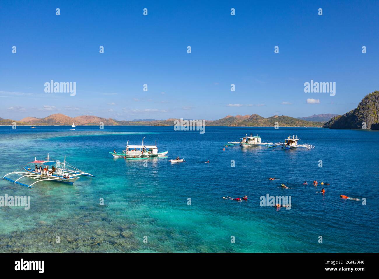 Aerial view of guests enjoying a snorkeling trip at the Skeleton Wreck ...