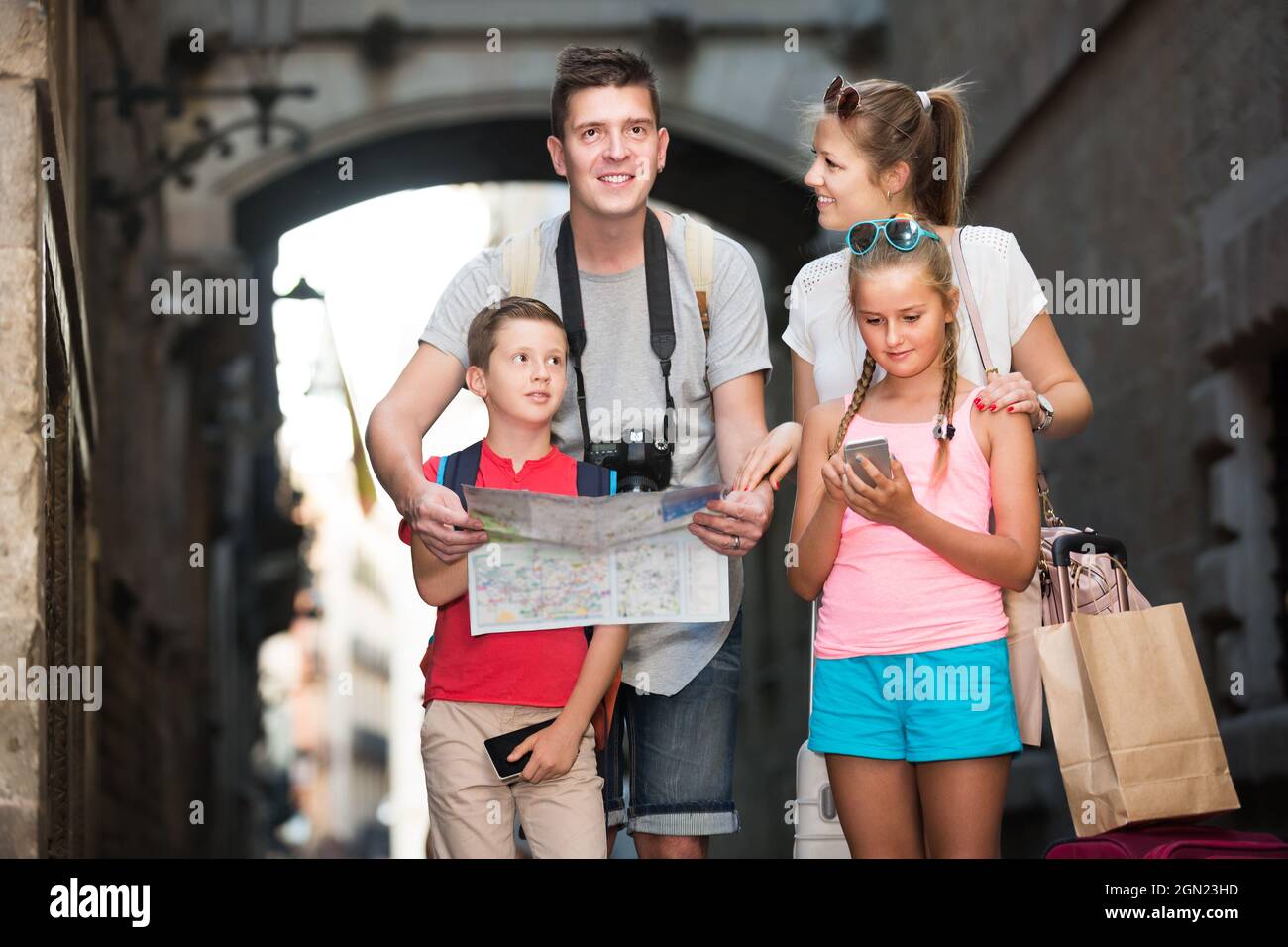 Adult family looking for destination Stock Photo - Alamy