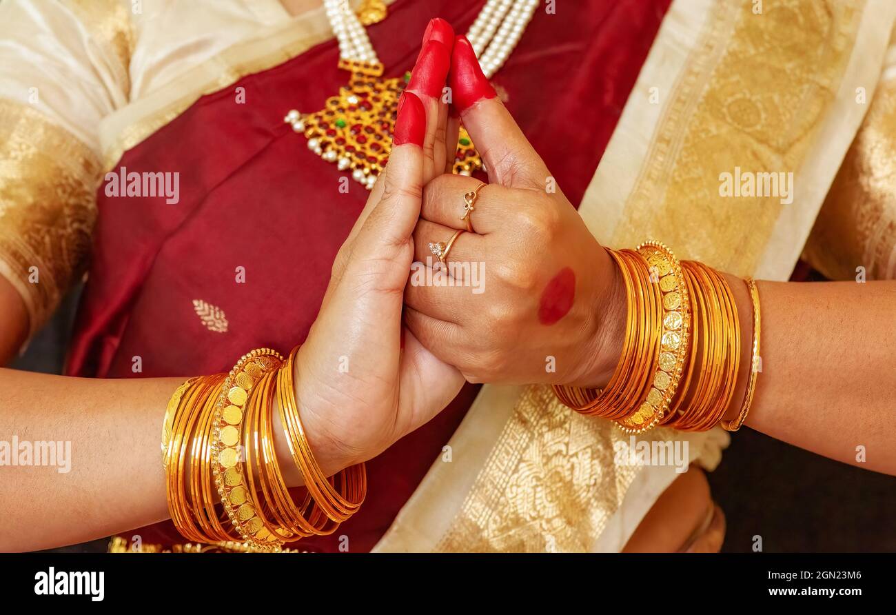 Woman hands showing "Shankhu hasta" denoting a conch as a mudra of ...