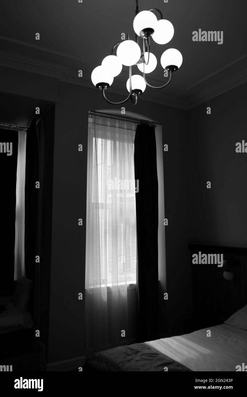 Grayscale of the interior of a bedroom in the house Stock Photo - Alamy