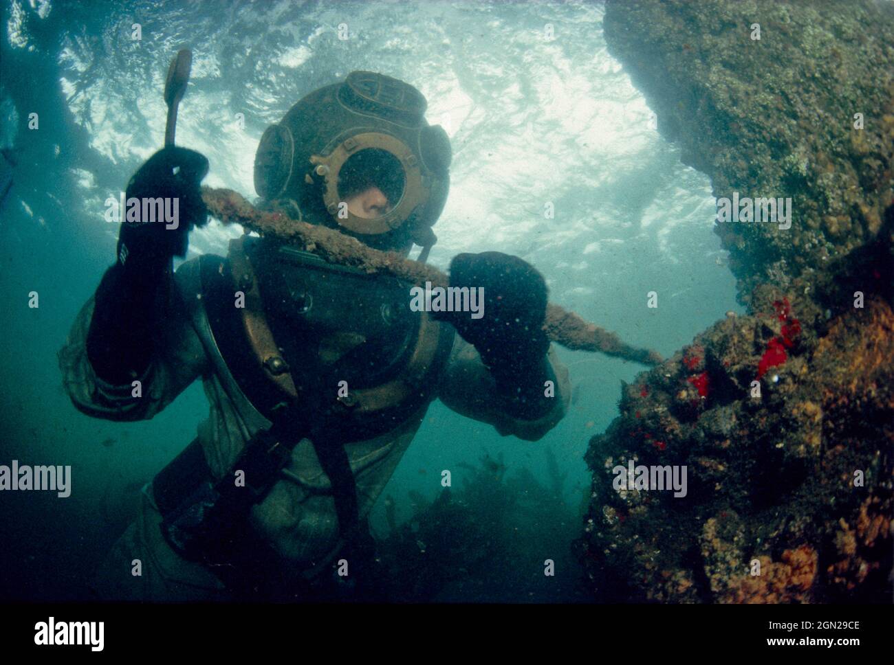 A hard-hat diver working on a pylon, near Manly, Sydney Harbour, New ...