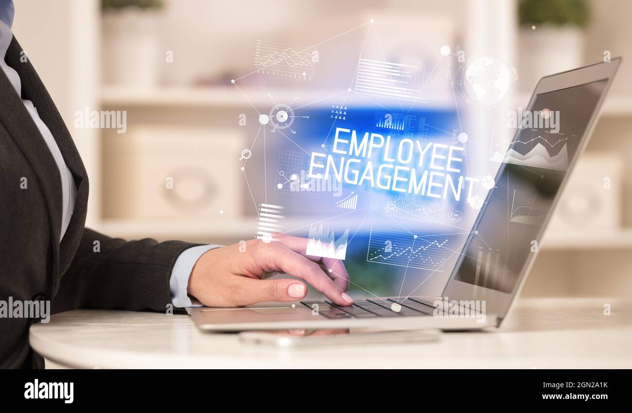 Side view of a business person working on laptop Stock Photo - Alamy