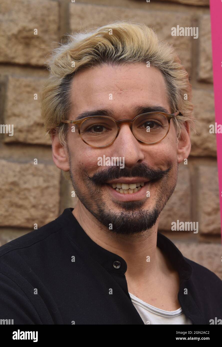 Cologne, Germany. 21st Sep, 2021. Comedian Serkan Ates-Stein poses at ...