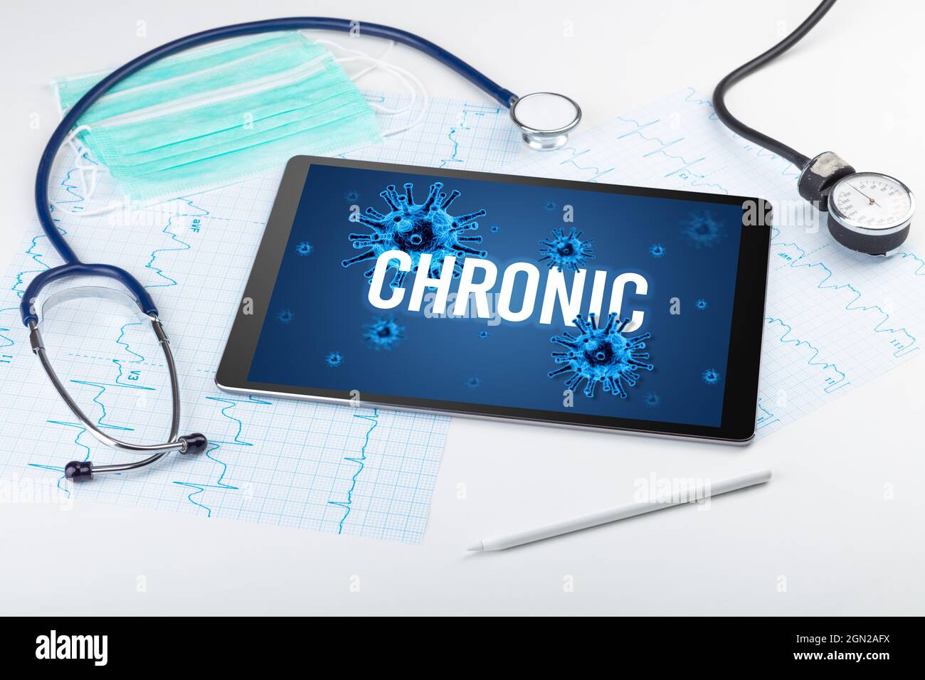 Tablet pc and doctor tools on white surface Stock Photo - Alamy