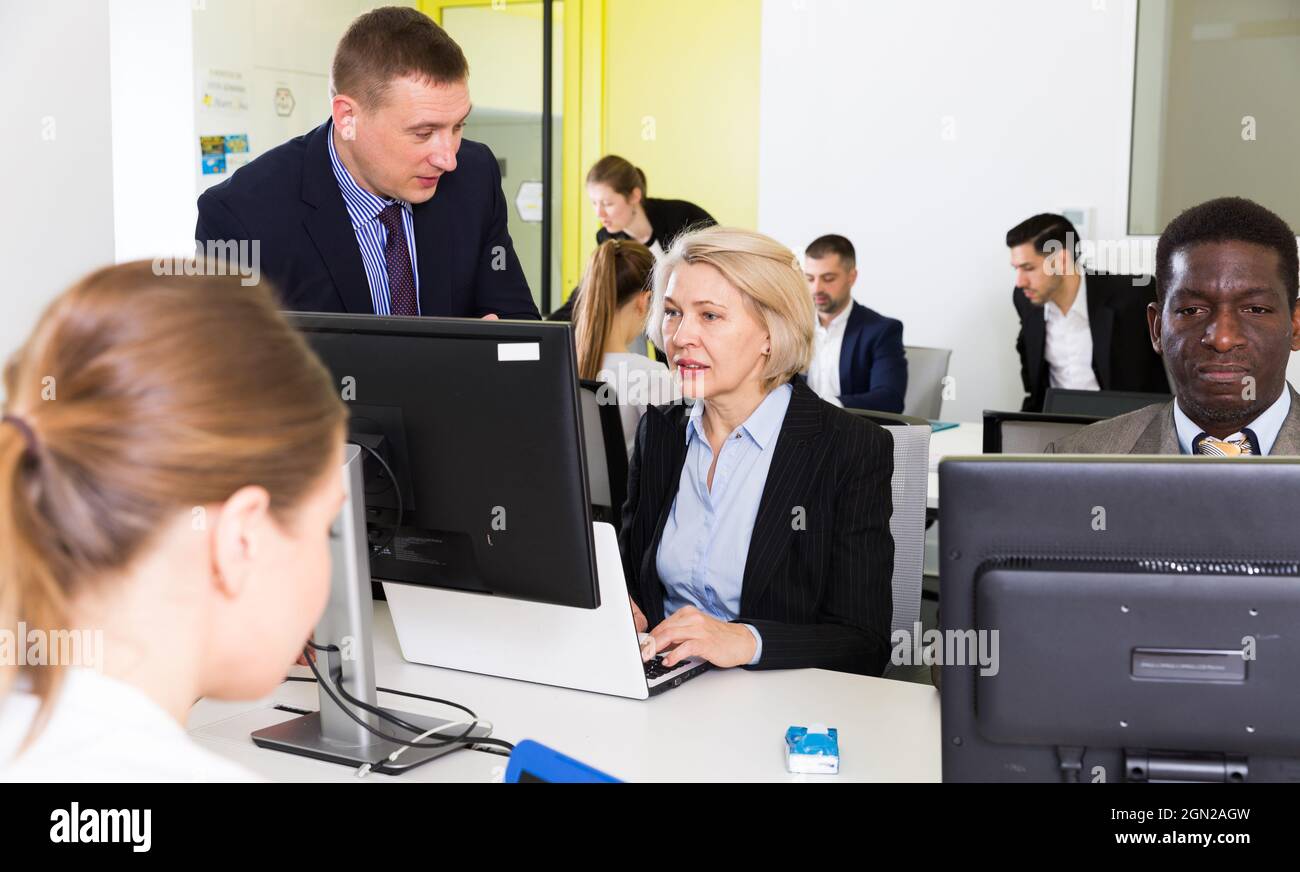 Coworkers in office people in coworking open space office hi-res stock ...