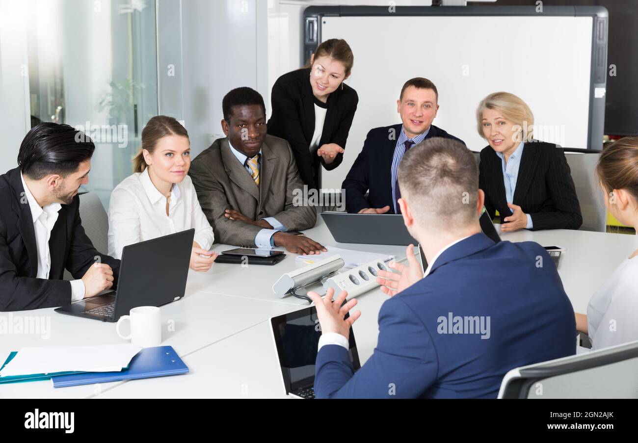 Multinational group of confident business people planning work Stock ...