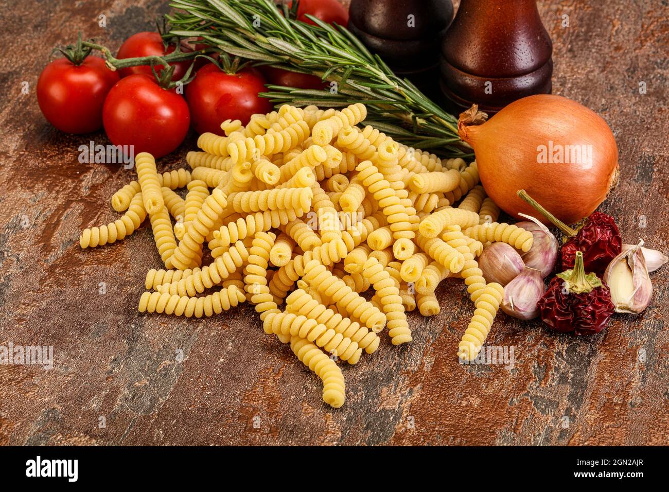 Raw Italian wheat pasta - Fusilli for cooking Stock Photo - Alamy