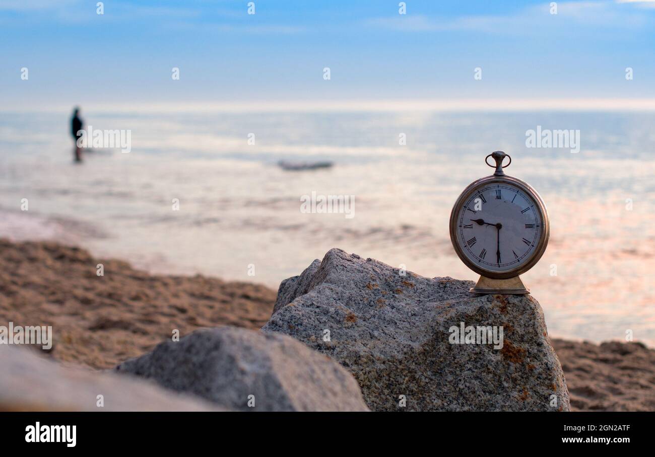 Vintage watch on sand beach hi-res stock photography and images - Alamy