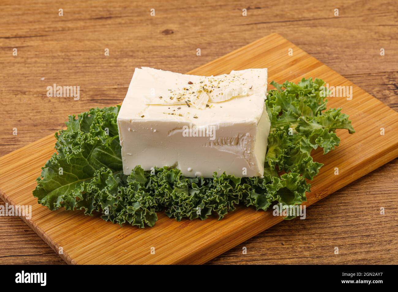Traditional tasty Greek Feta soft cheese brick Stock Photo - Alamy