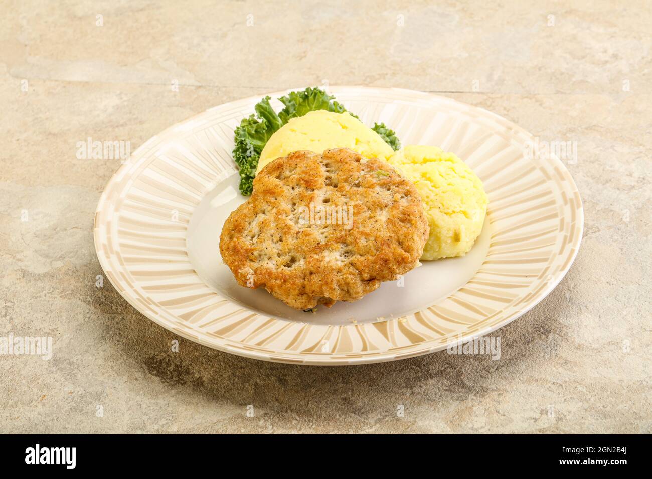 Minced Chicken cutlet with mashed potato Stock Photo - Alamy