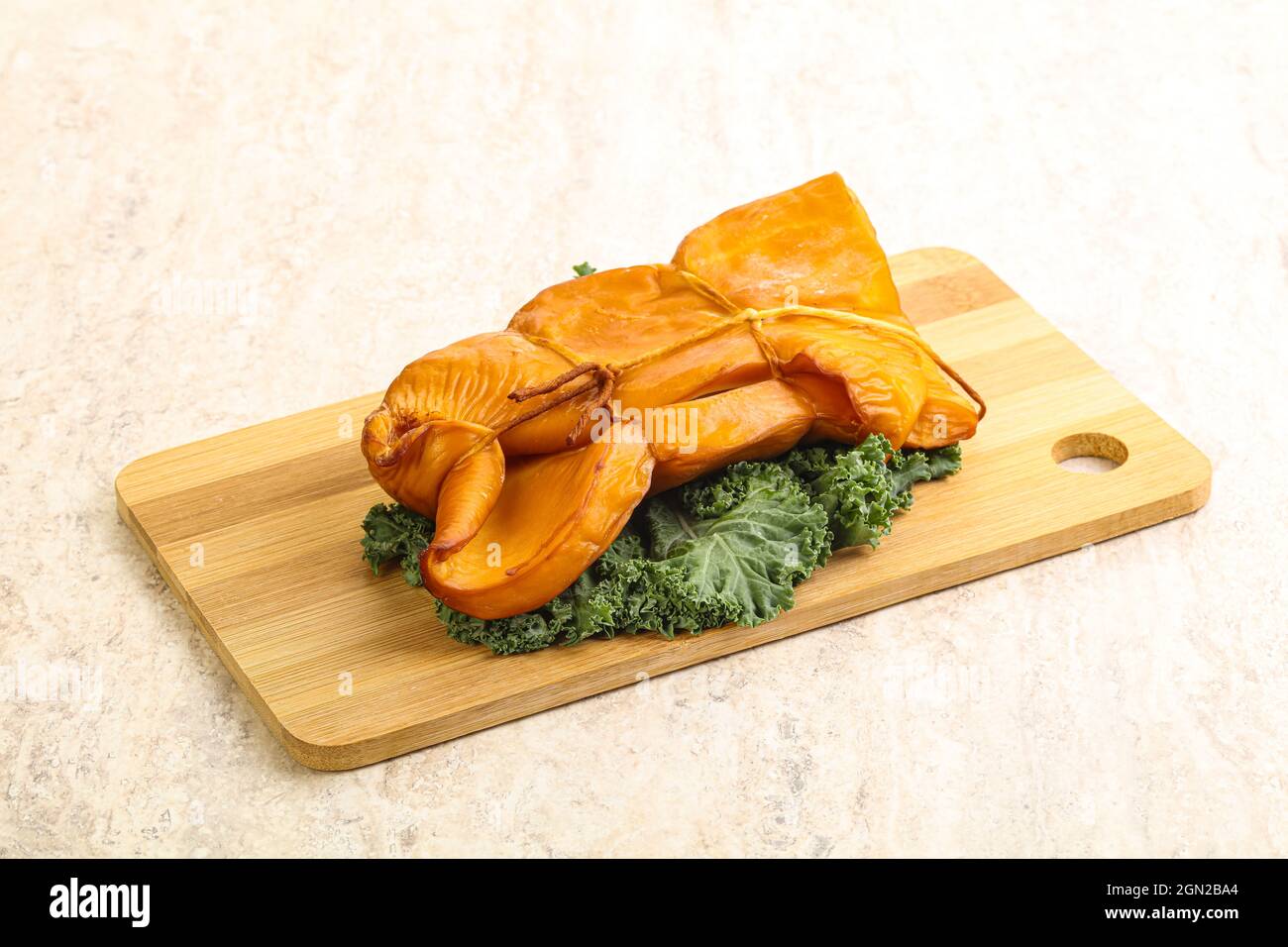 Smoked squid calamar appetizer snack isolated Stock Photo - Alamy