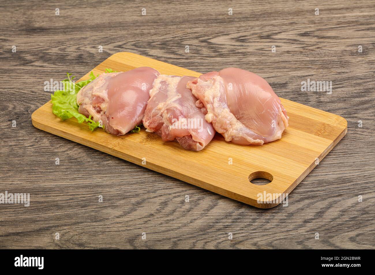 Raw chicken boneless and skinless leg for cooking Stock Photo - Alamy
