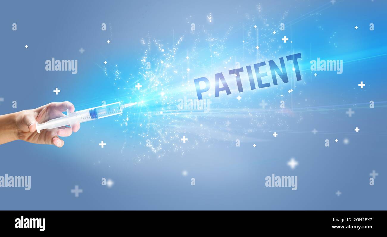 Syringe, medical injection in hand Stock Photo - Alamy
