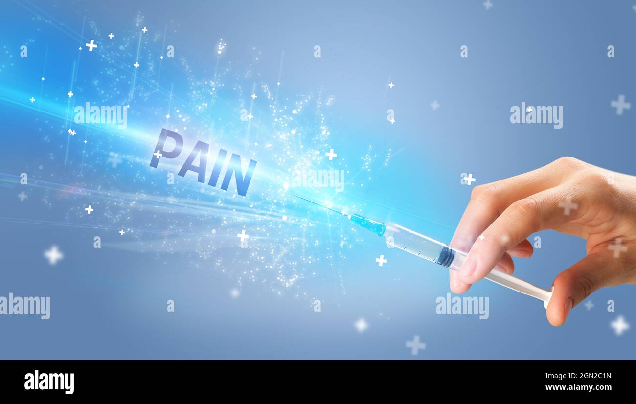 Syringe, medical injection in hand Stock Photo - Alamy