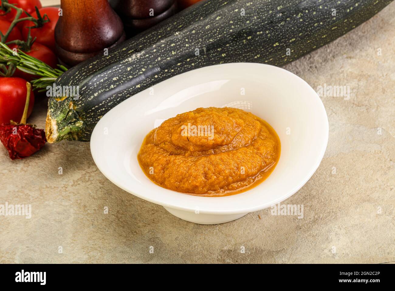 Vegetarian cuisine - Zucchini puree with herbs and spices Stock Photo ...