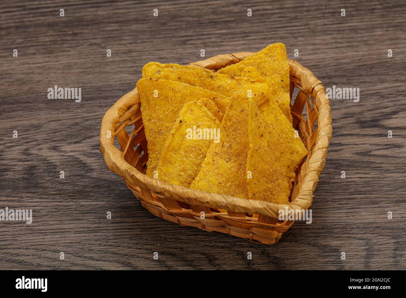 Mexican crunchy corn nachos triangle heap Stock Photo - Alamy