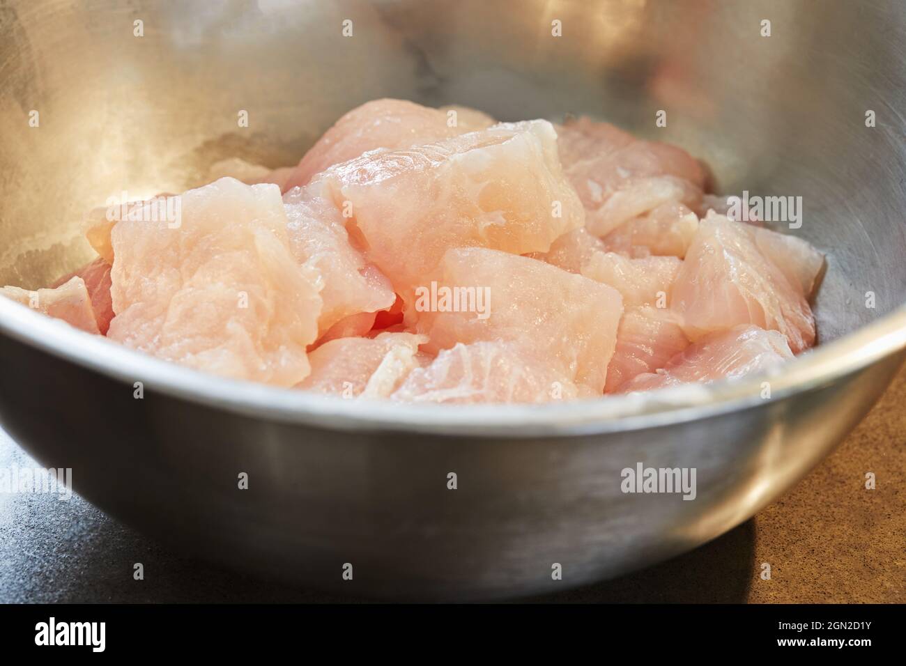 Hand was sliced fish to make sushi hi-res stock photography and images ...