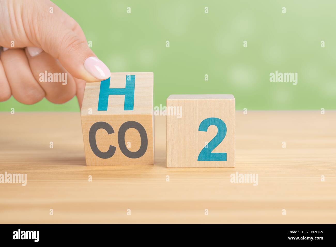 Switching to hydrogen fuel. Change to fuel cell vehicles. Hand flips a ...