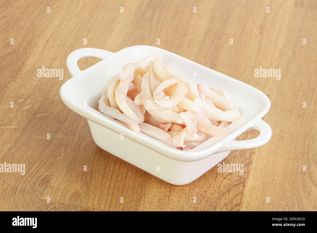 Marinated squid strips snack in the bowl Stock Photo - Alamy