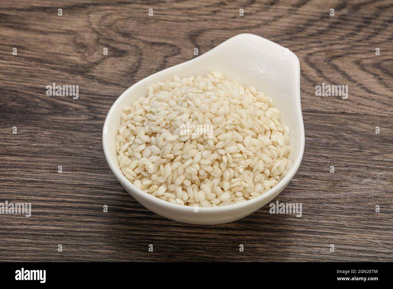 Raw Italian arborio rice for Risotto Stock Photo - Alamy