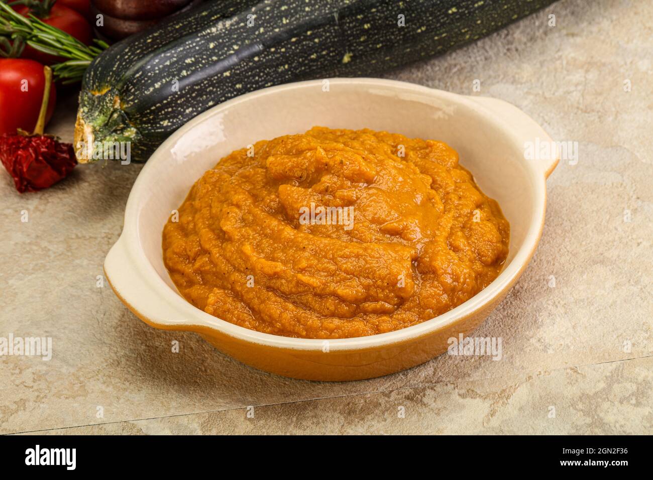 Vegetarian cuisine - Zucchini puree with herbs and spices Stock Photo ...