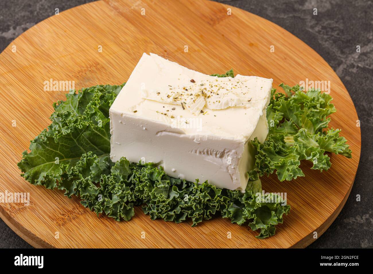 Traditional tasty Greek Feta soft cheese brick Stock Photo - Alamy