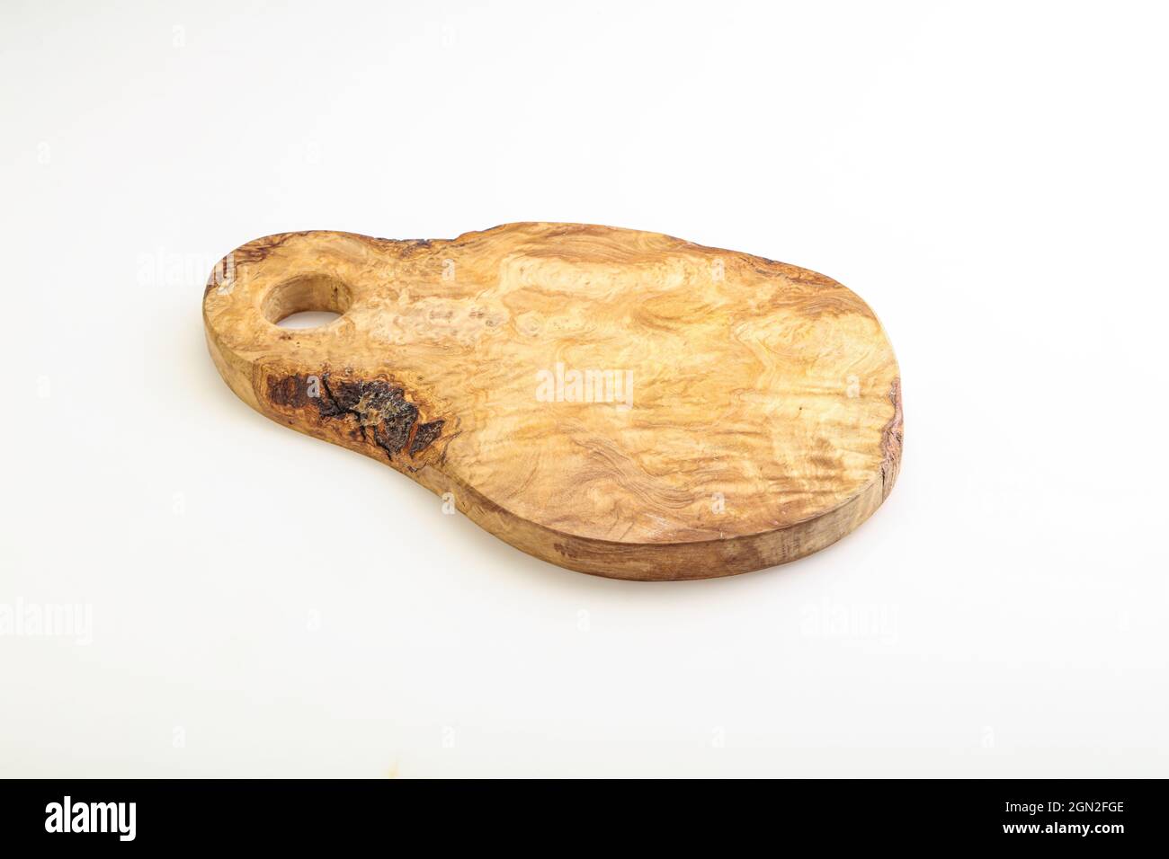 Olive tree board for kitchen isolated Stock Photo - Alamy