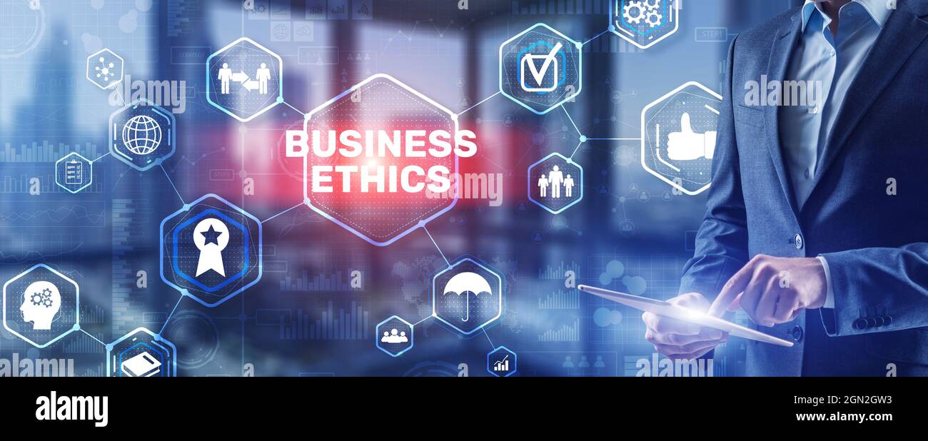 Business man writing business ethic concept on virtual screen Stock ...