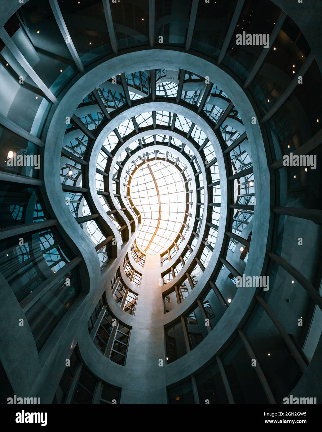 Low angle inside a modern building with geometrical walls and dome ...