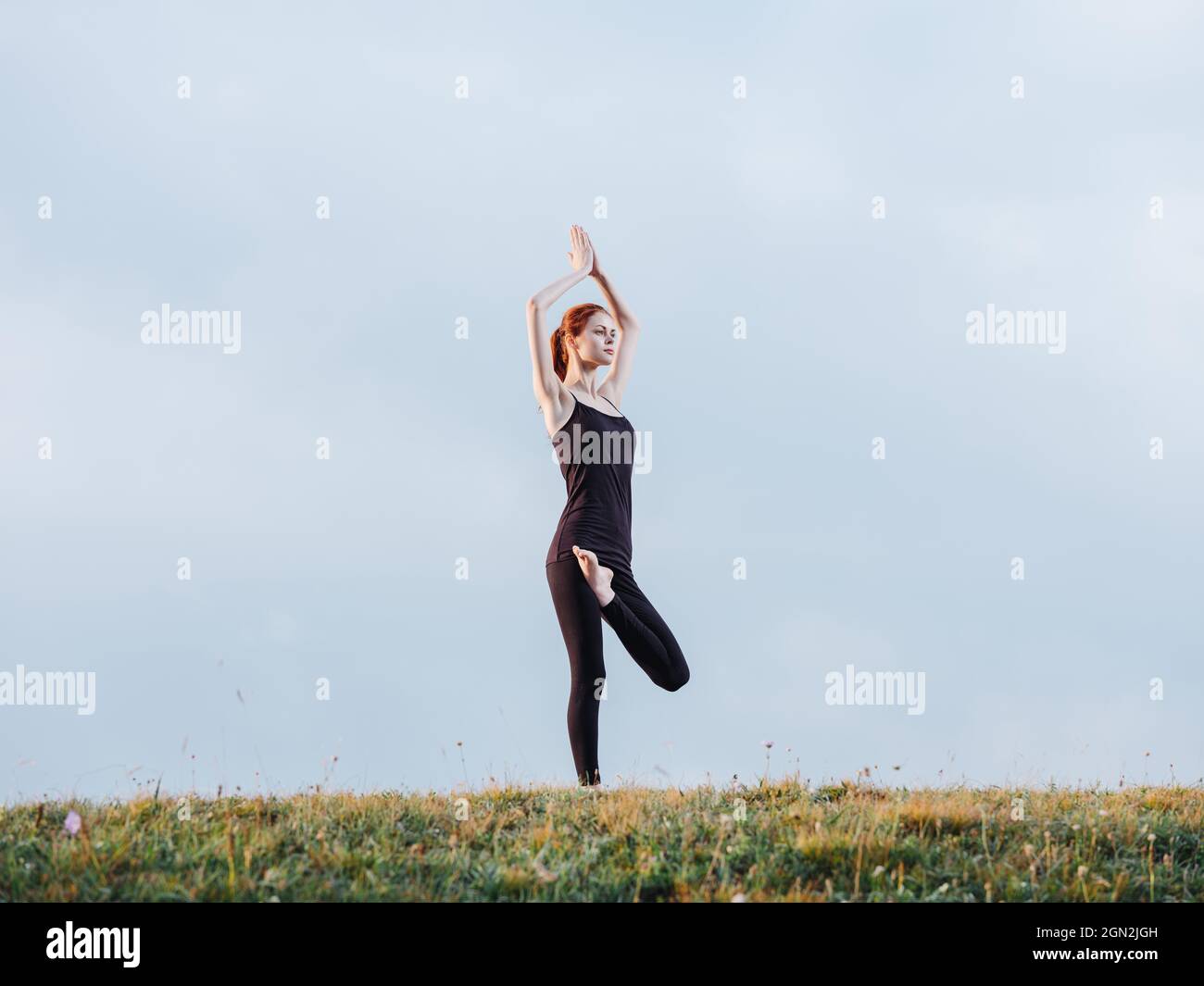 athletic woman chords fresh air exercise freedom Stock Photo - Alamy