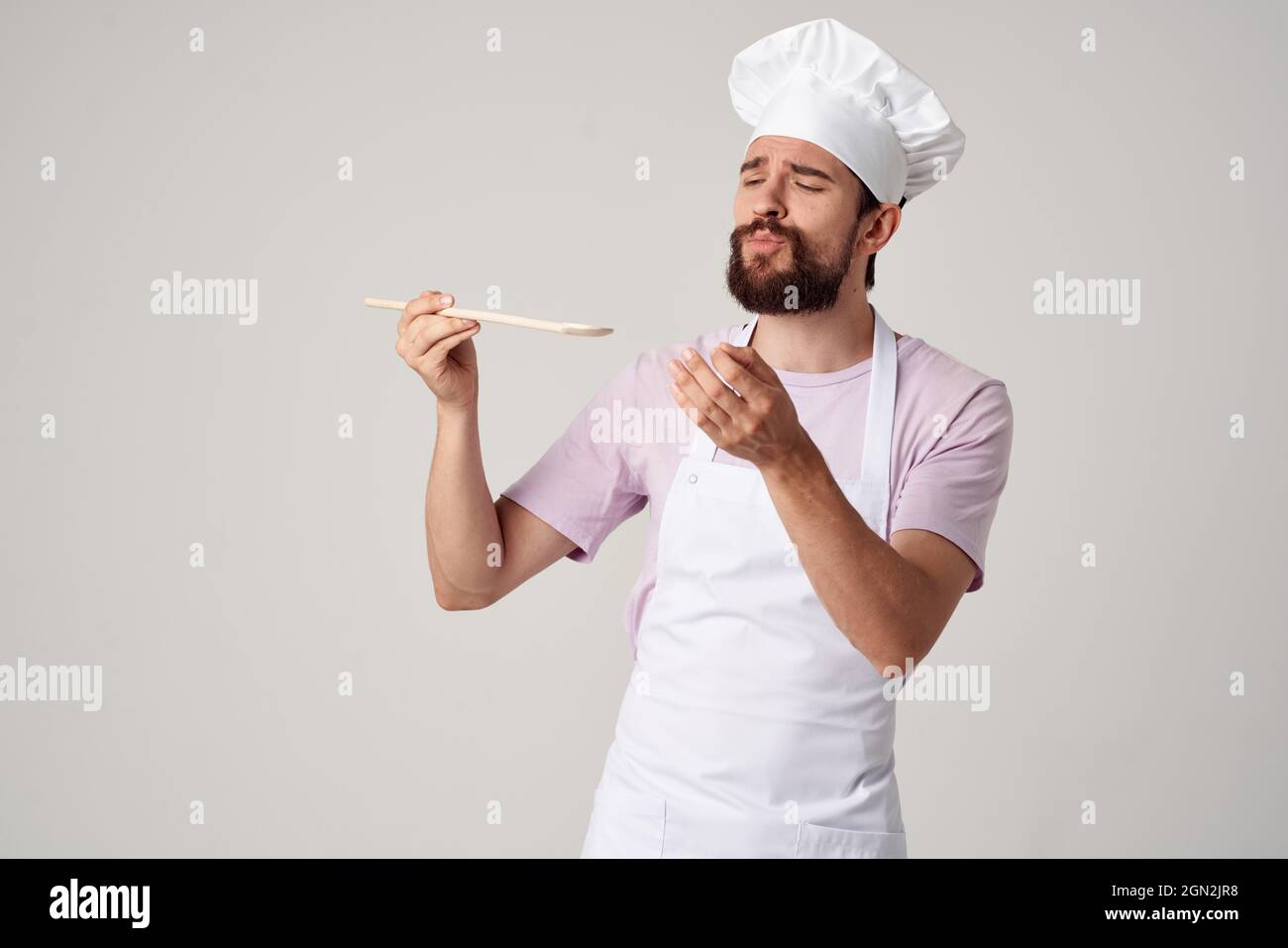 male chef in an apron walking professional cooking restaurant Stock ...