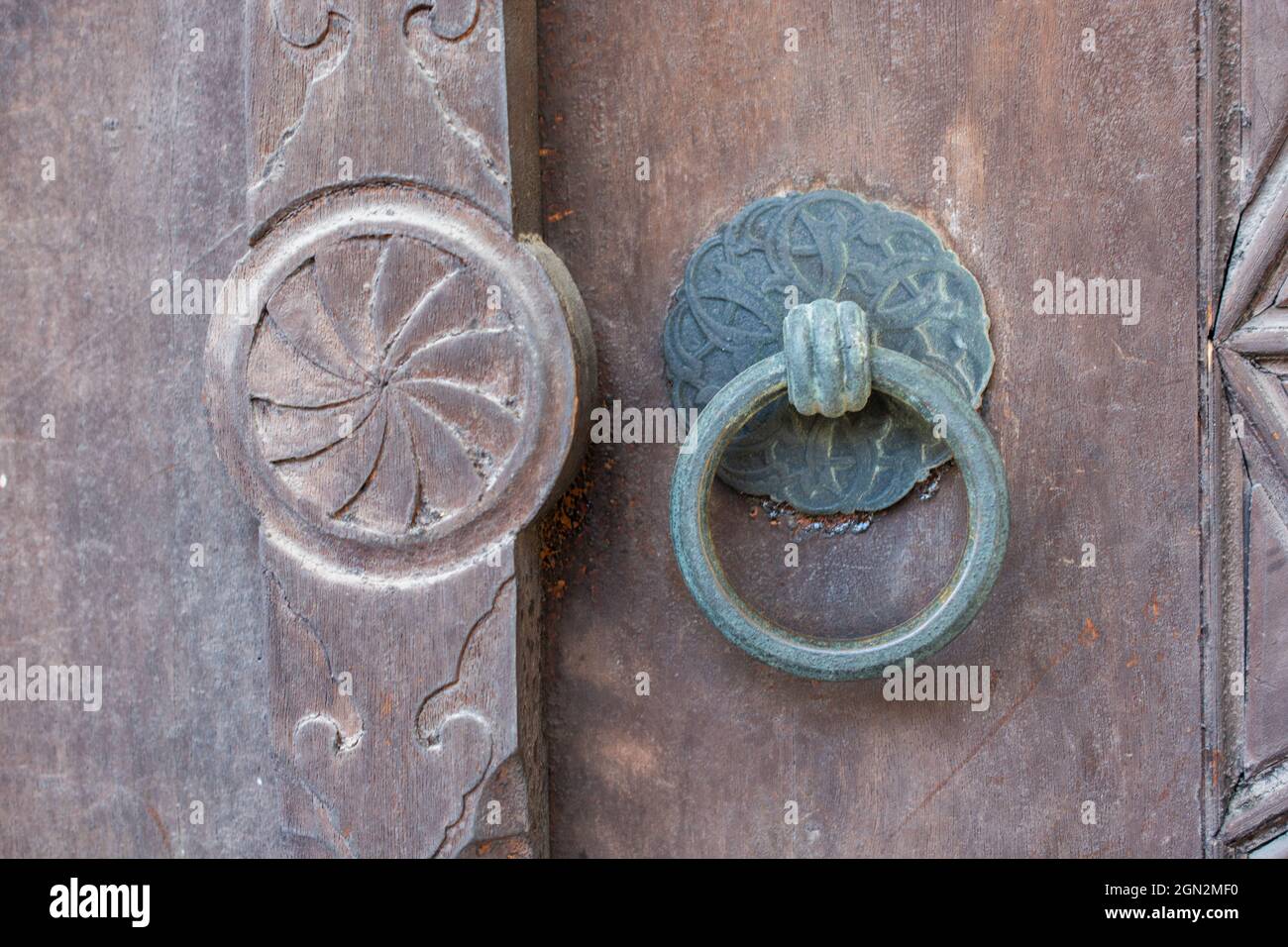 Close up shot of an old gate's holder for the ability to open and close ...