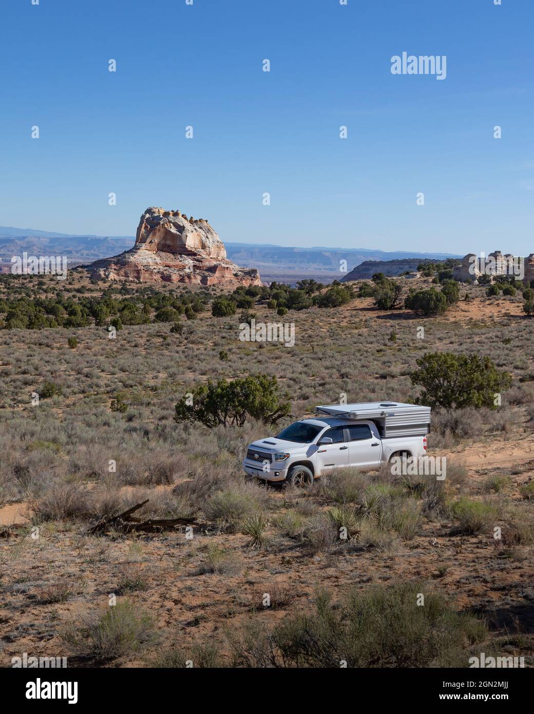 WHITE POCKET, UNITED STATES - Aug 16, 2021: A white truck with a camper ...