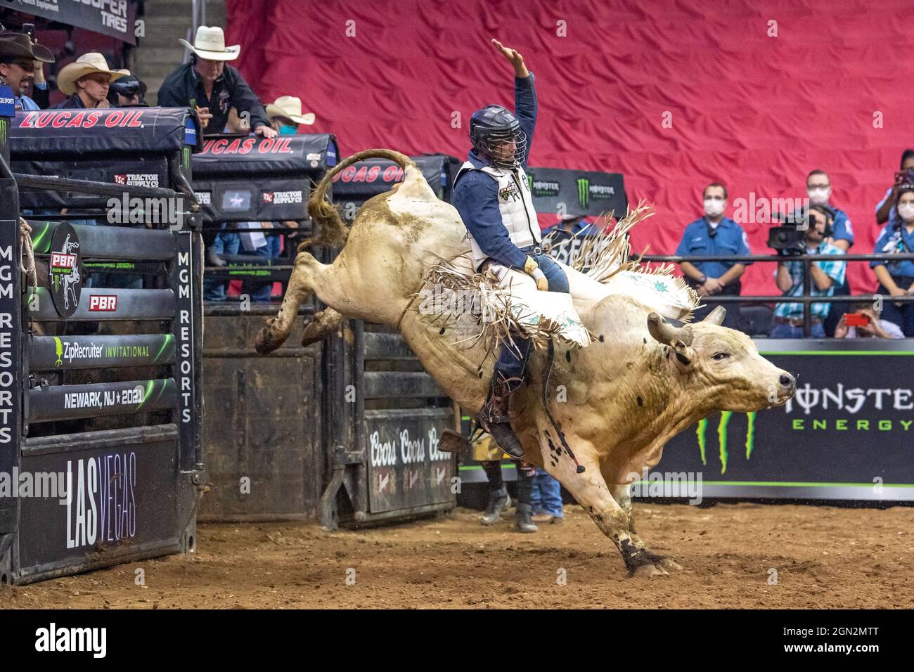 Eli Vastbinder rides White Dust during the Professional Bull Riders ...
