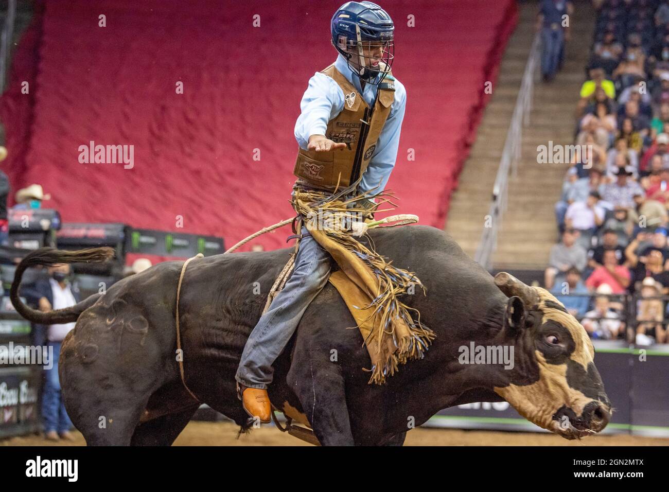 Chase Dougherty rides Dr. X during the Professional Bull Riders 2021 ...