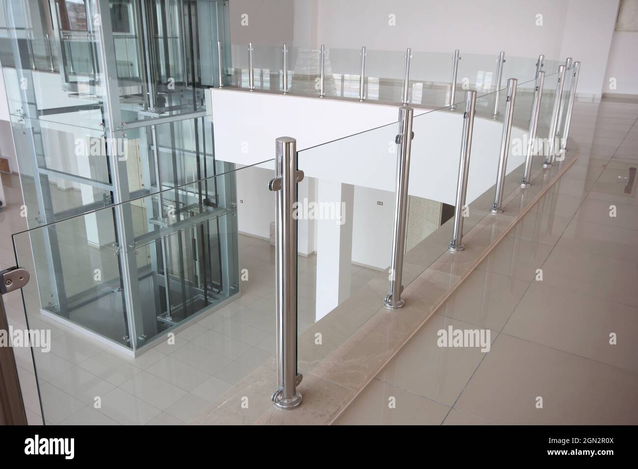 Modern glass elevator railings hi-res stock photography and images - Alamy