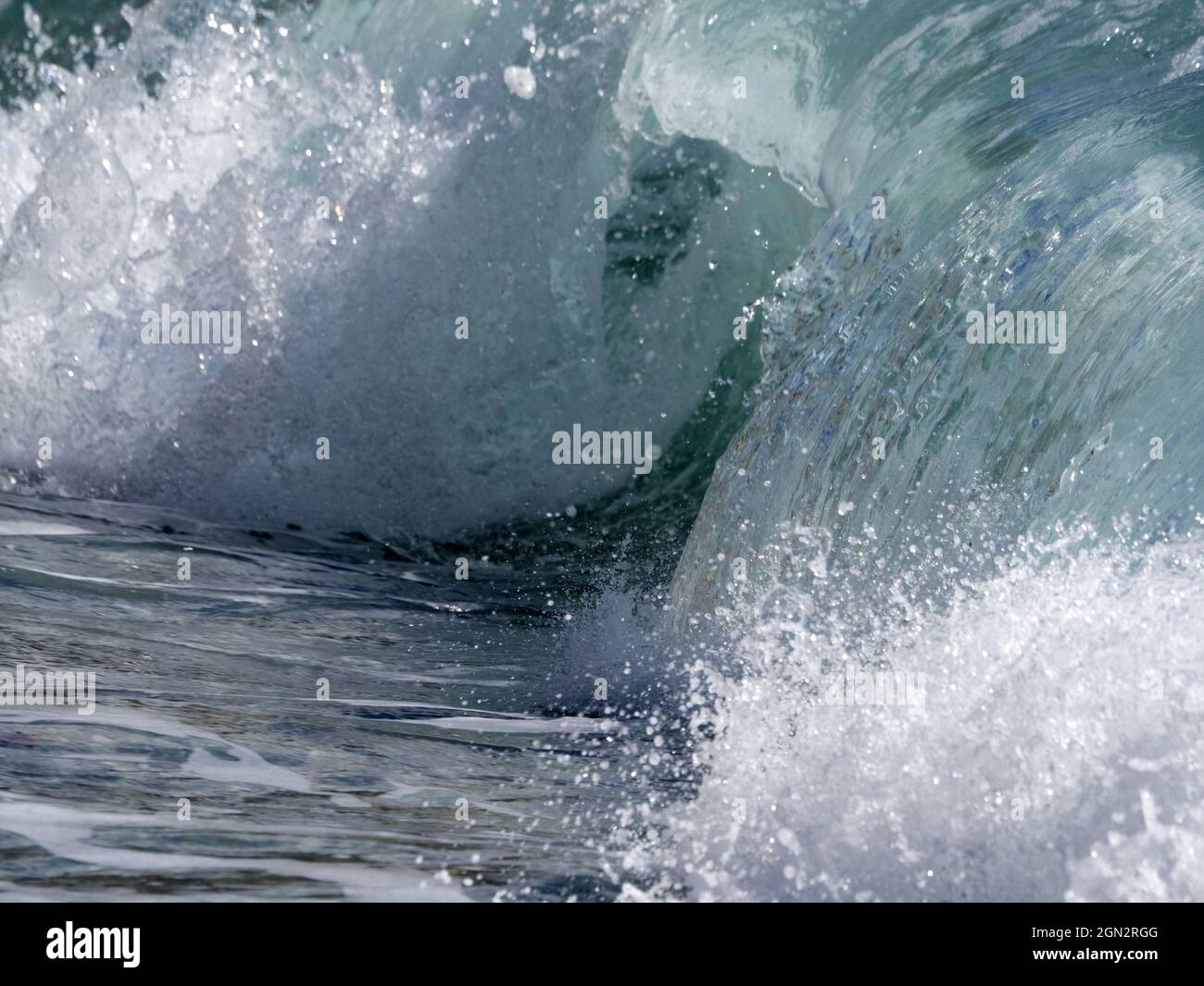 Sea wave on the shore detail Stock Photo - Alamy