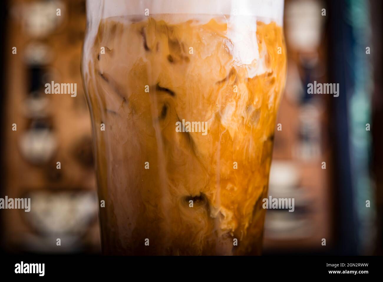 iced coffee drink with coffee menu board as background Stock Photo - Alamy