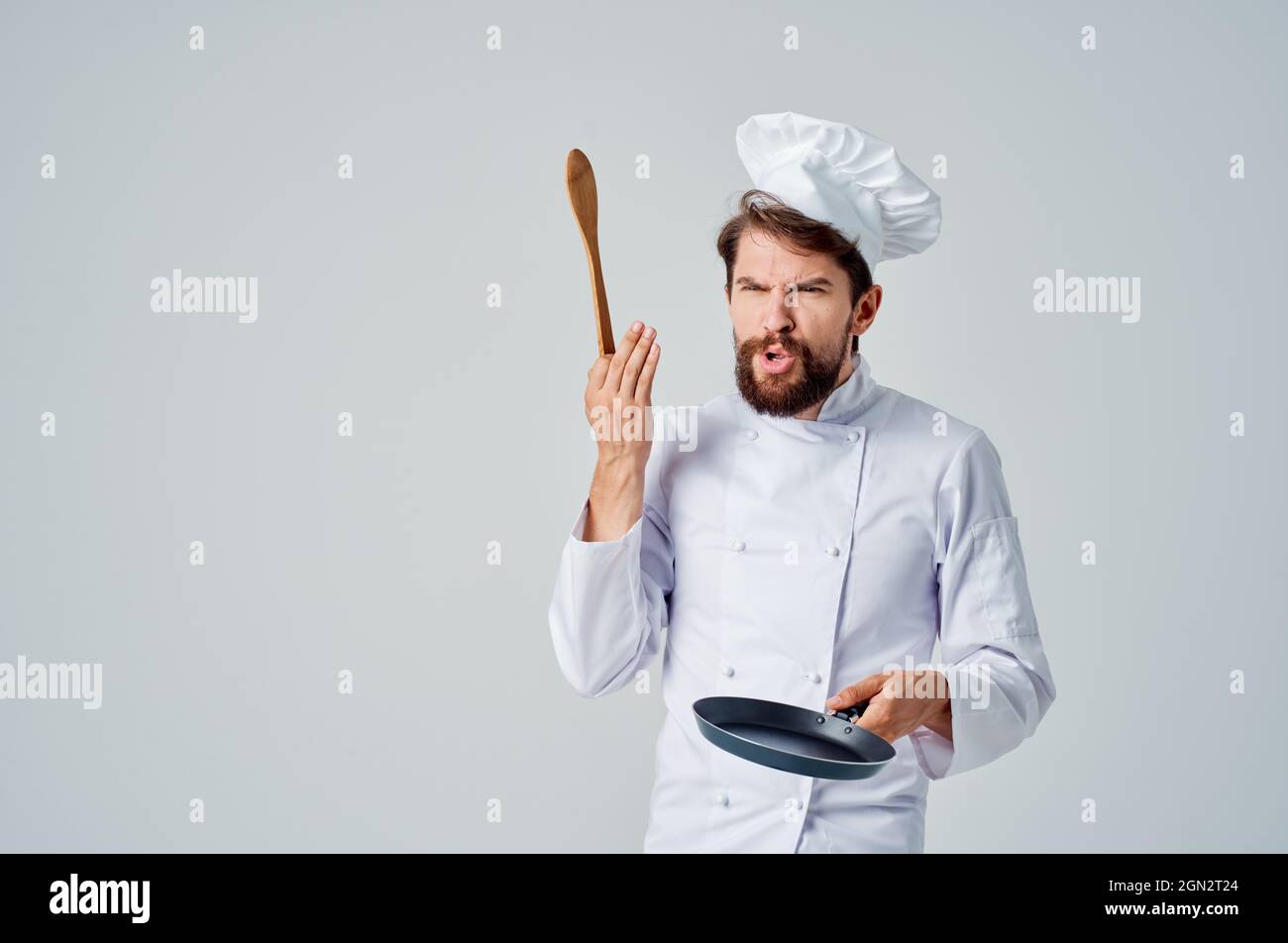 professional chef frying pan in hands restaurant kitchen Stock Photo ...